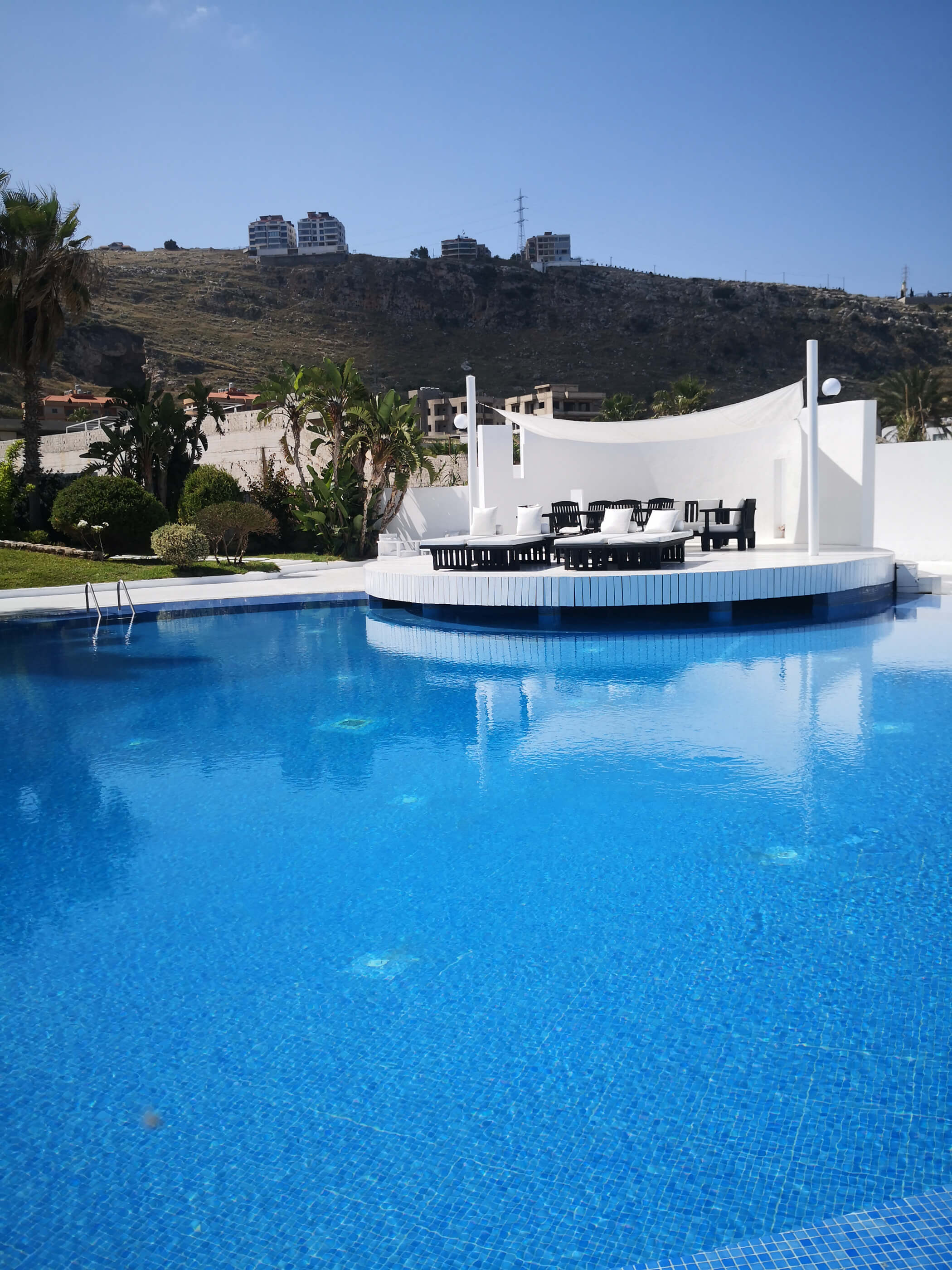 Orchid Beach Resort | Huts and Sunbeds in Jiyeh