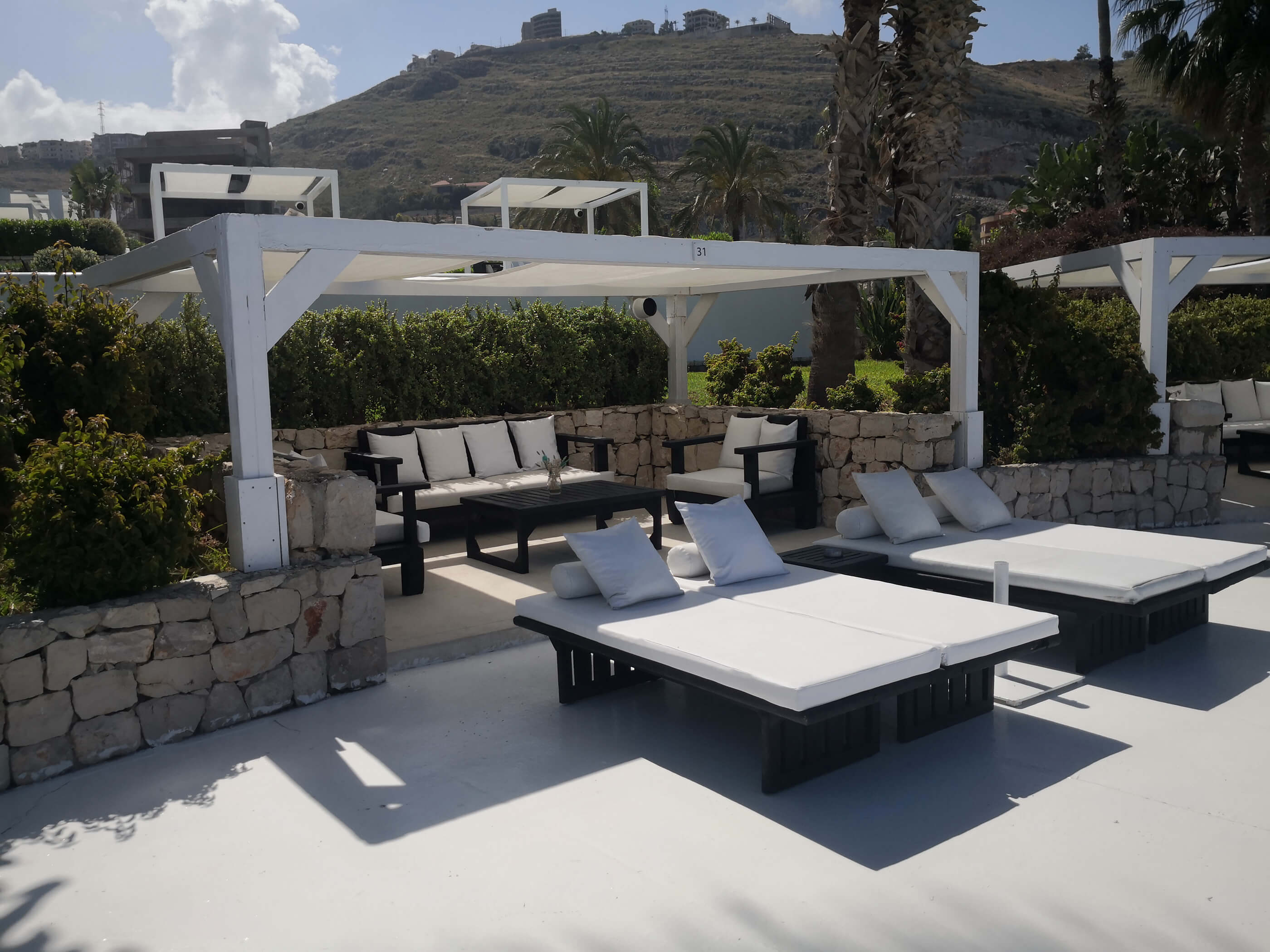 Orchid Beach Resort | Huts and Sunbeds in Jiyeh