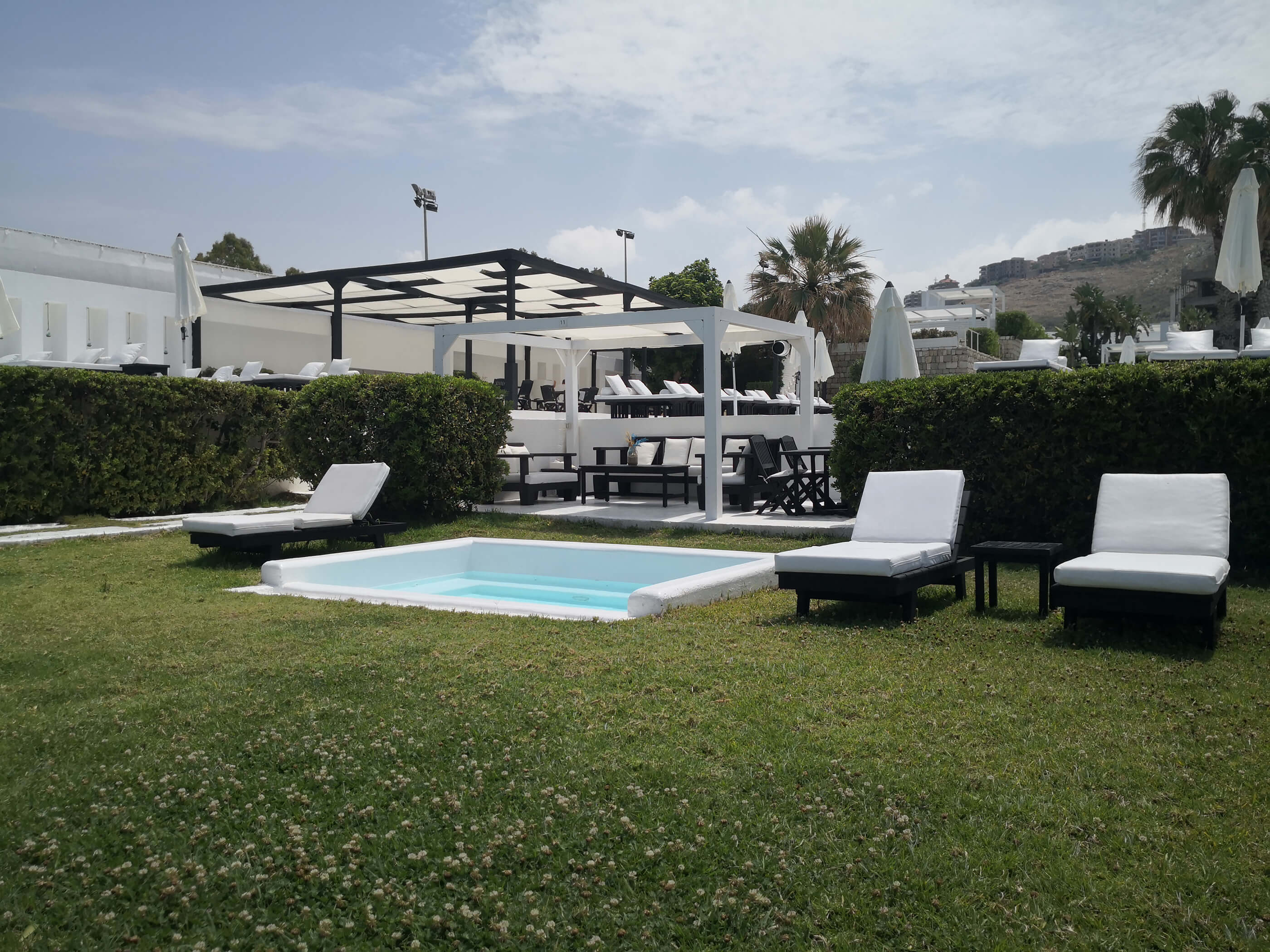 Orchid Beach Resort | Huts and Sunbeds in Jiyeh