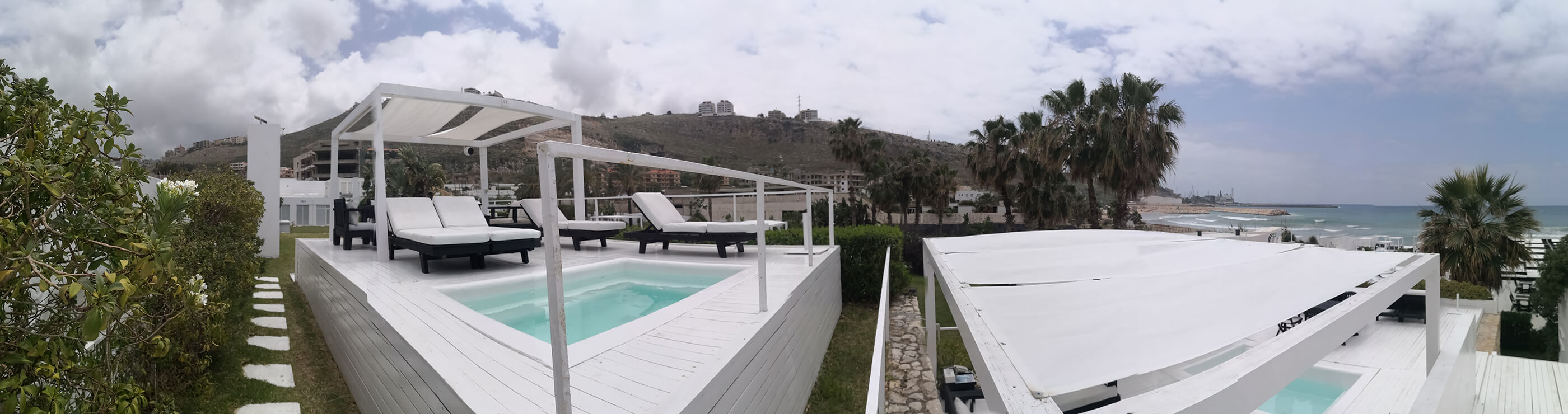 Orchid Beach Resort | Huts and Sunbeds in Jiyeh