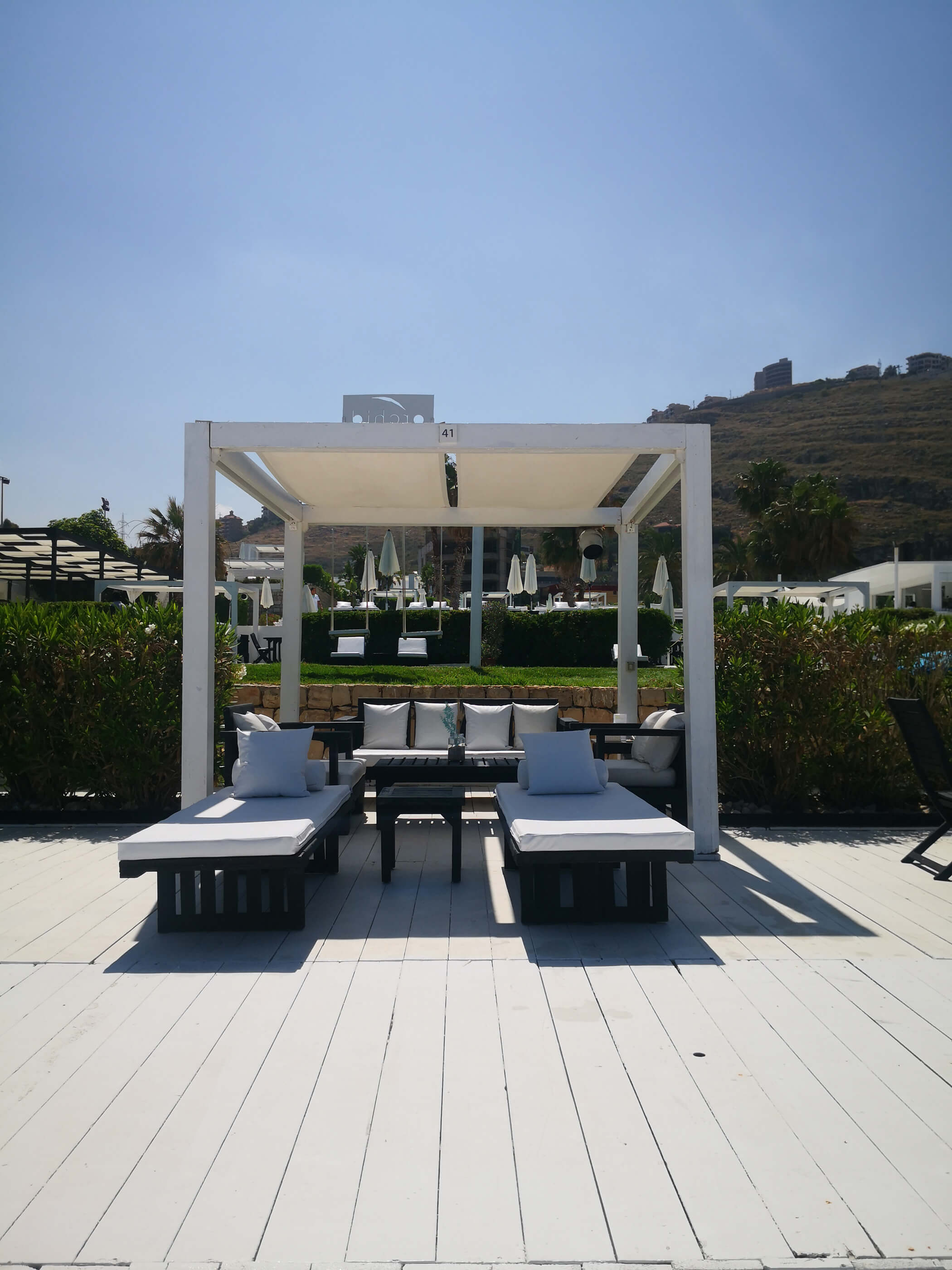 Orchid Beach Resort | Huts and Sunbeds in Jiyeh