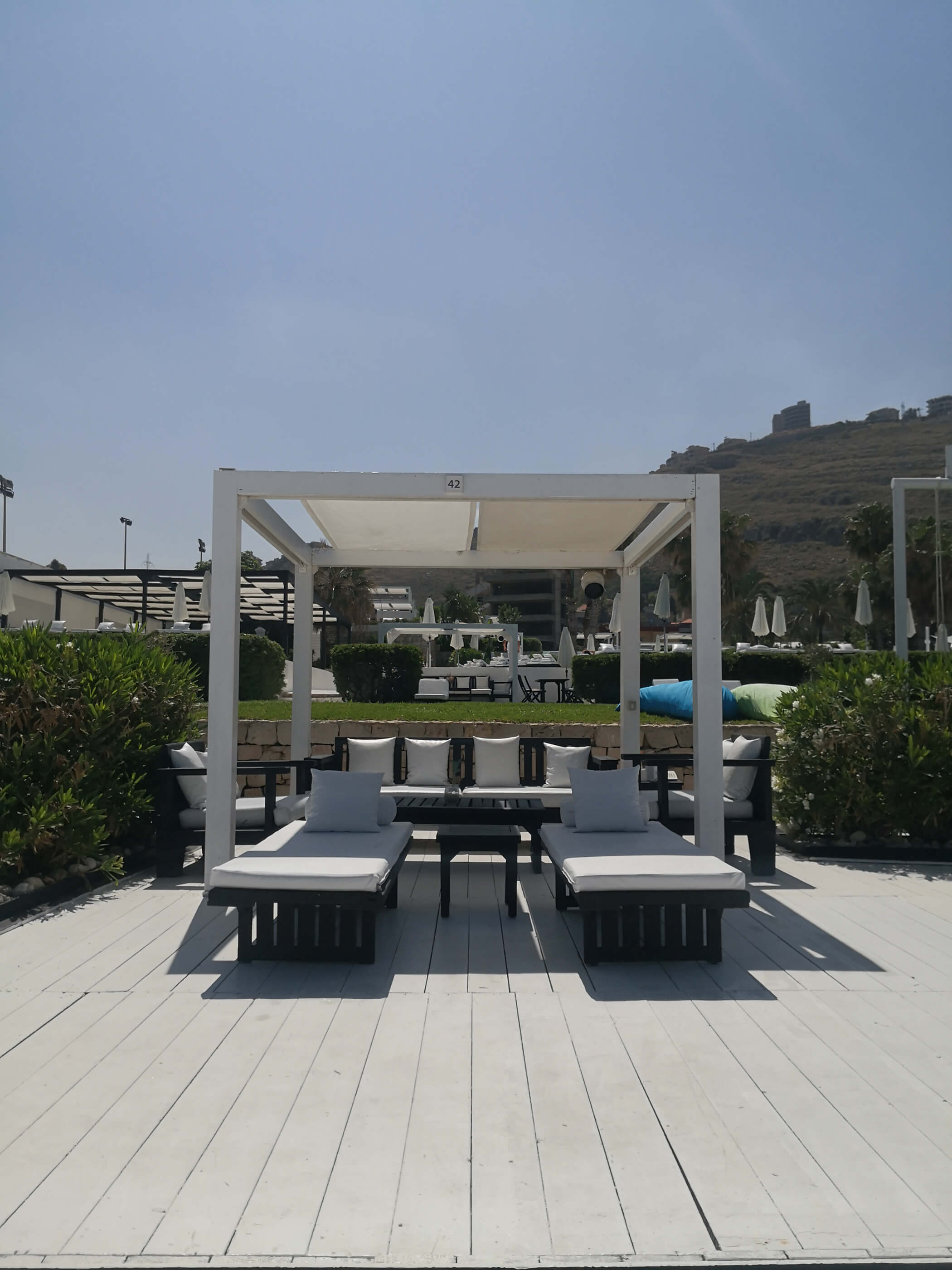 Orchid Beach Resort | Huts and Sunbeds in Jiyeh